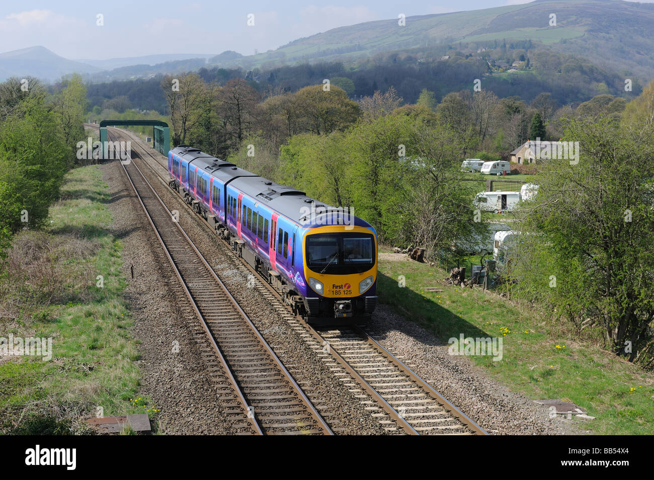 An express passenger train passes through the picturesque Hope Valley ...