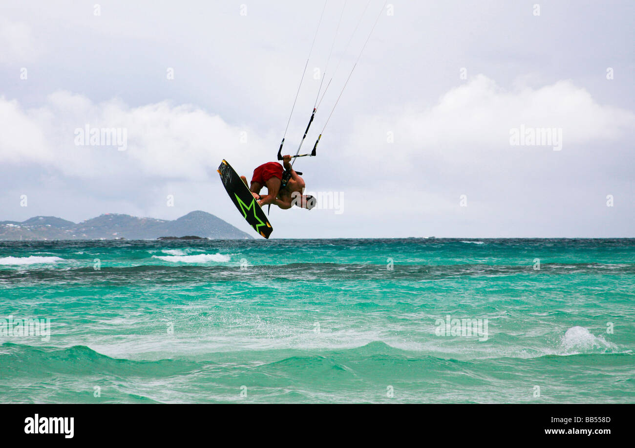 Kite surfer jumping waves Stock Photo - Alamy