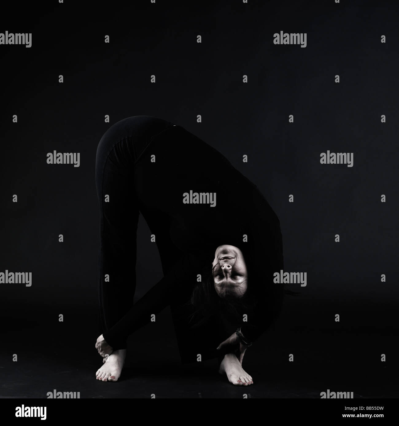 standing twist yoga pose Stock Photo - Alamy