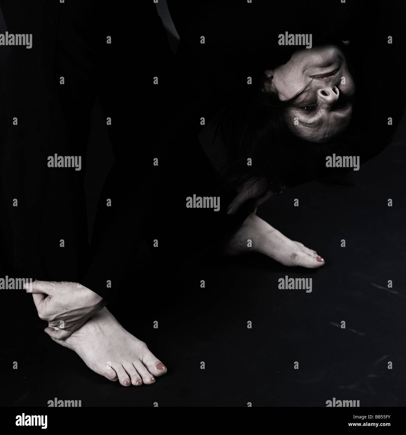 yoga standing twist pose Stock Photo - Alamy