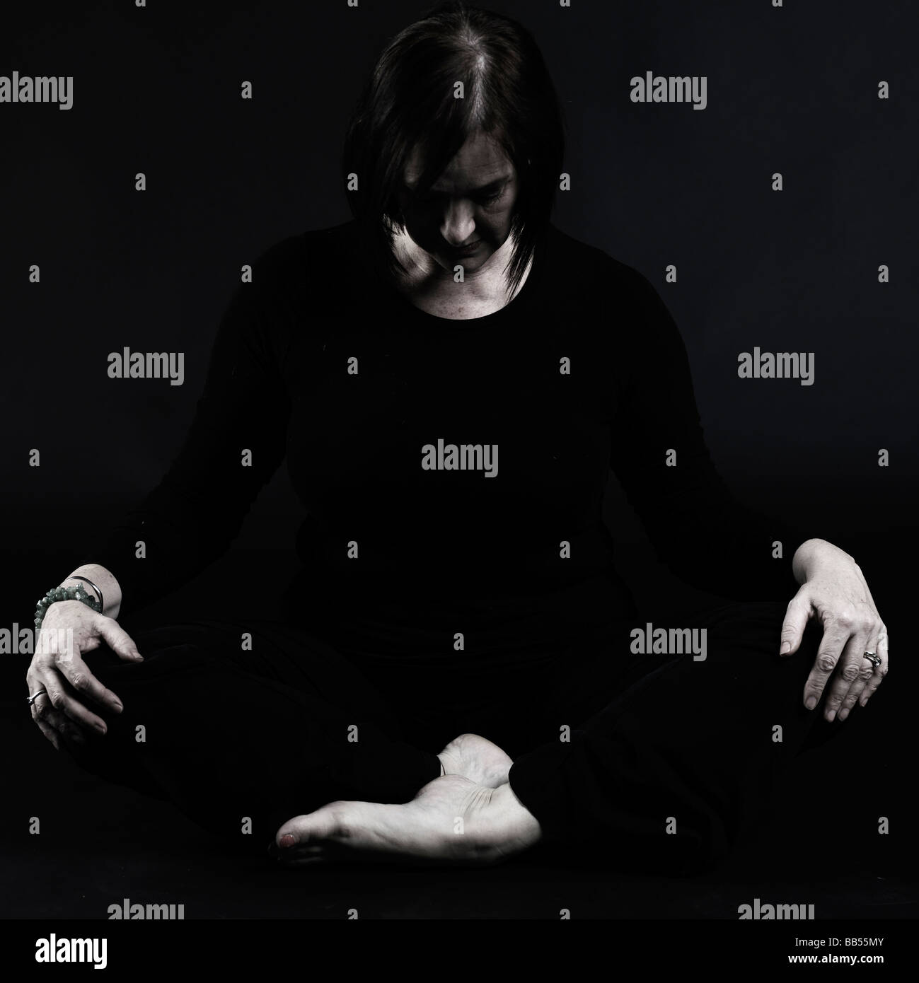 yoga meditation posture head bend forward Stock Photo - Alamy