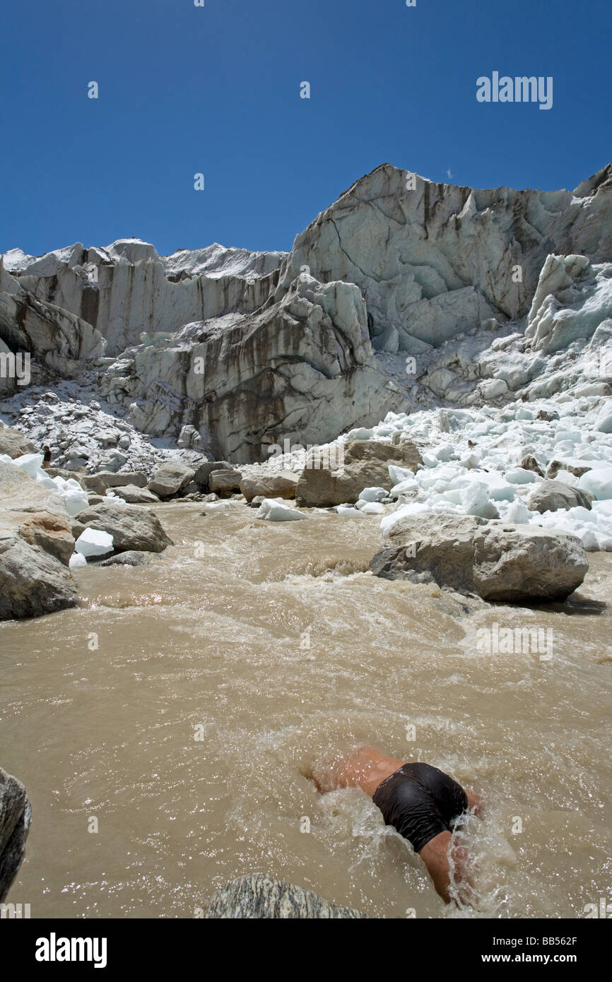 Pilgrim bathing in the source of Ganges river. Gaumukh Glacier (3892m ...