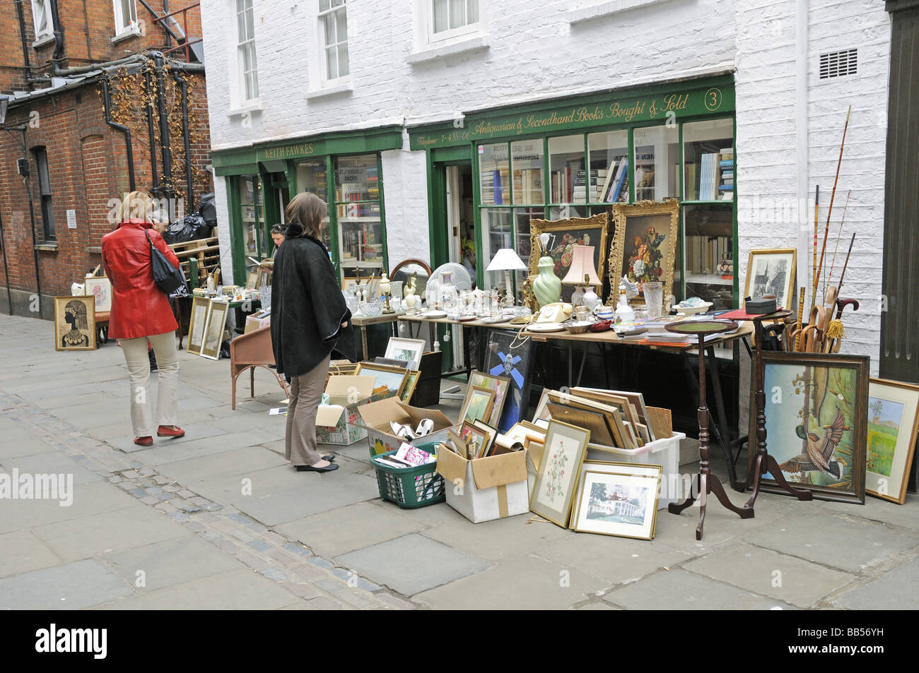 Antique shop and stall with customers Hampstead London England UK Stock ...