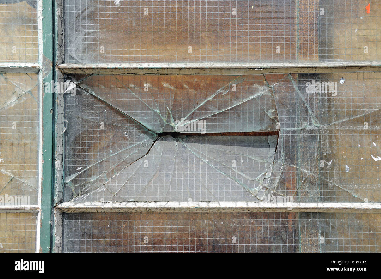 Broken window Hackney England UK Stock Photo - Alamy