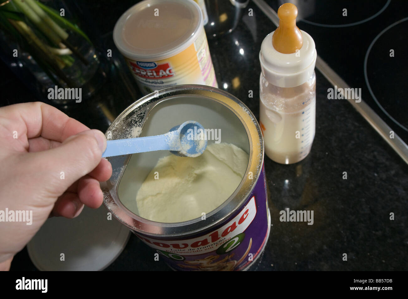 preparing the milk for a baby Stock Photo - Alamy