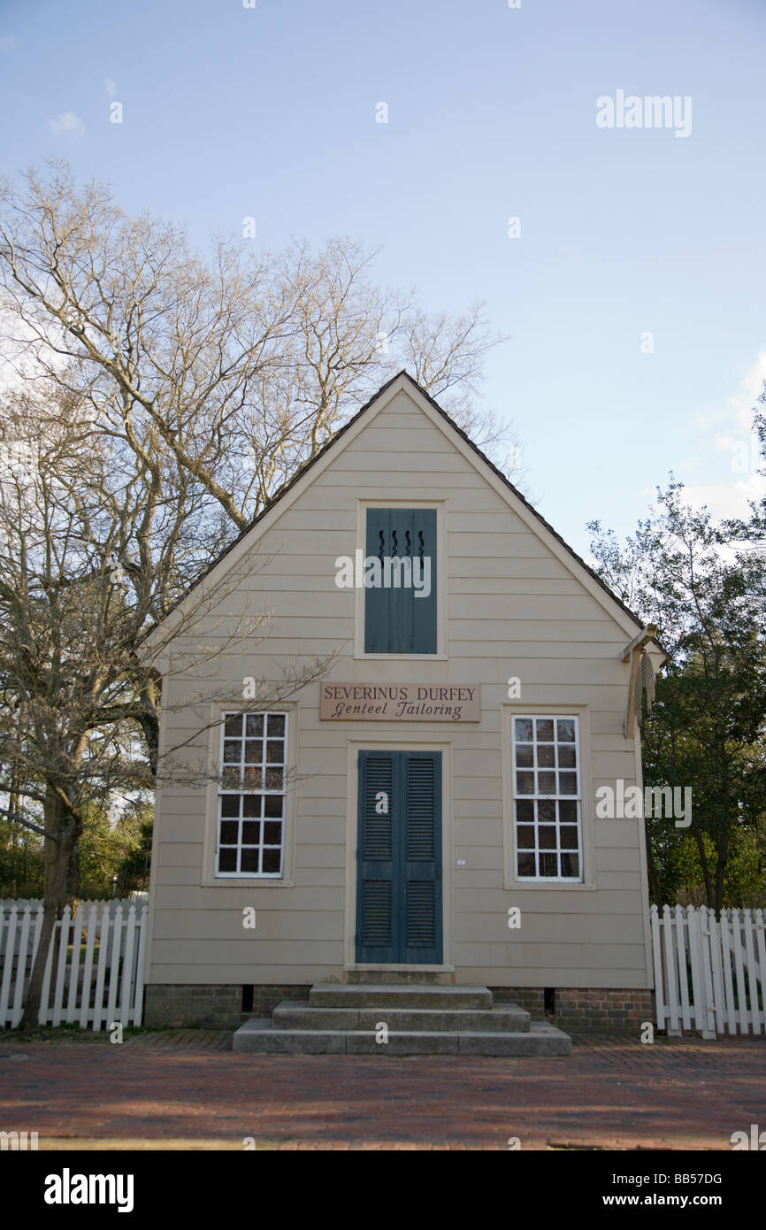 Colonial-style houses, including a tailor's shop, line the streets of ...