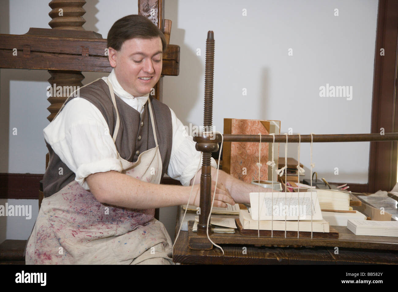 A period actor explains the printing process in Colonial Williamsburg ...