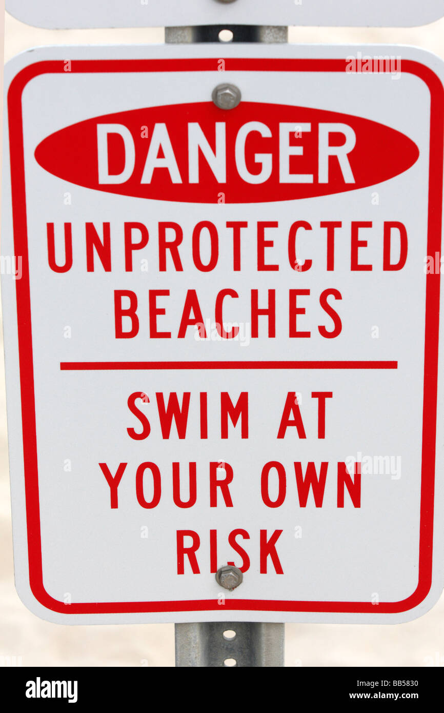 Sign Reading Danger Unprotected Beaches - Swim at Your Own Risk Stock ...
