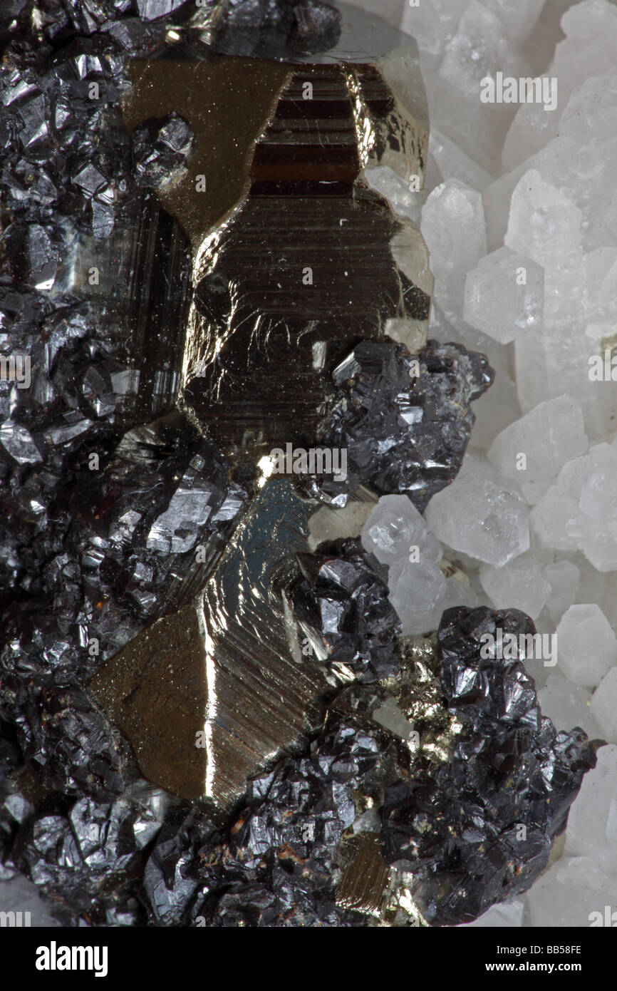 Sphalerite (dark color) Pyrite (golden color) and Quartz (white color ...