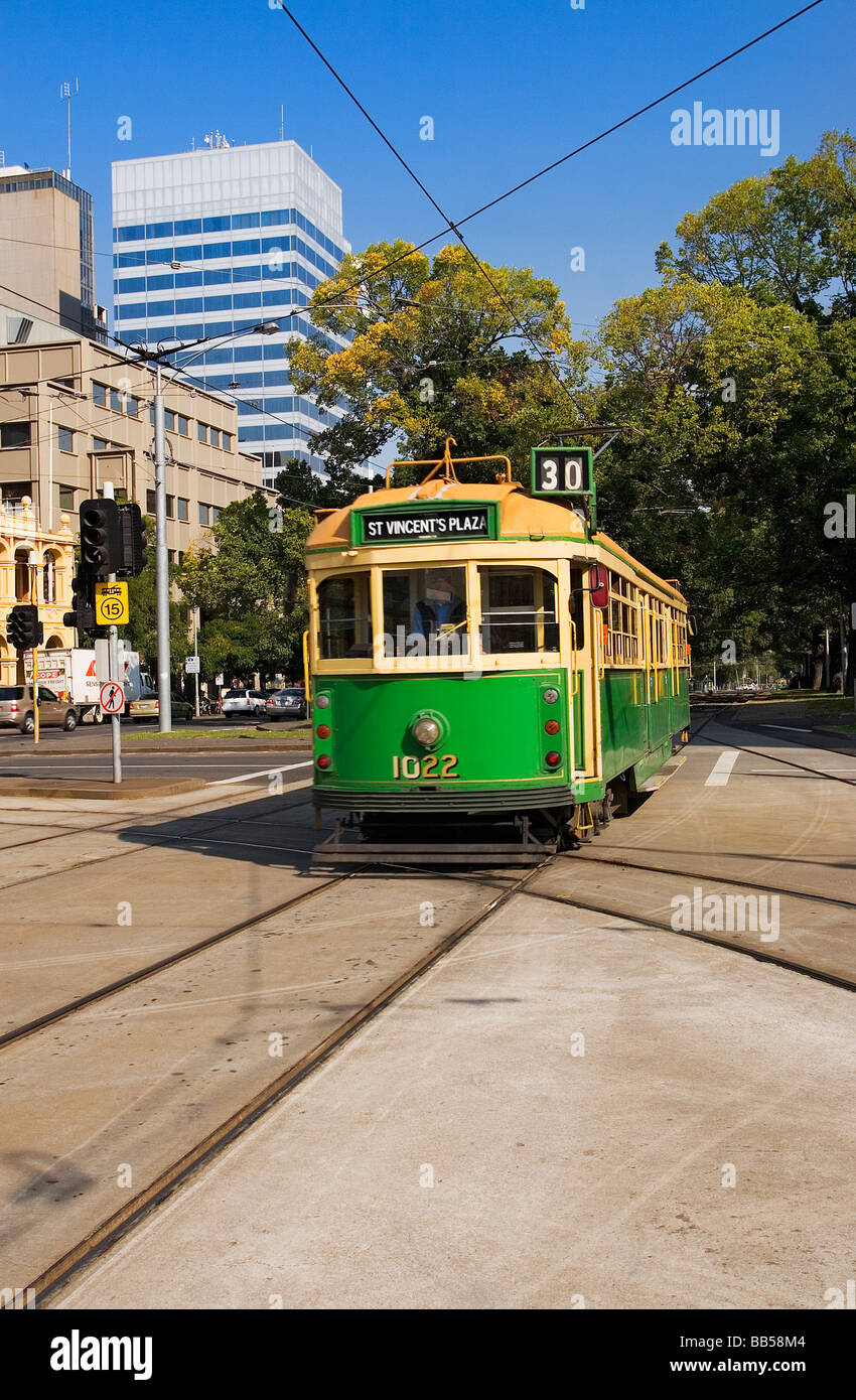 Melbourne Australia / A vintage Melbourne tram travels along a street ...