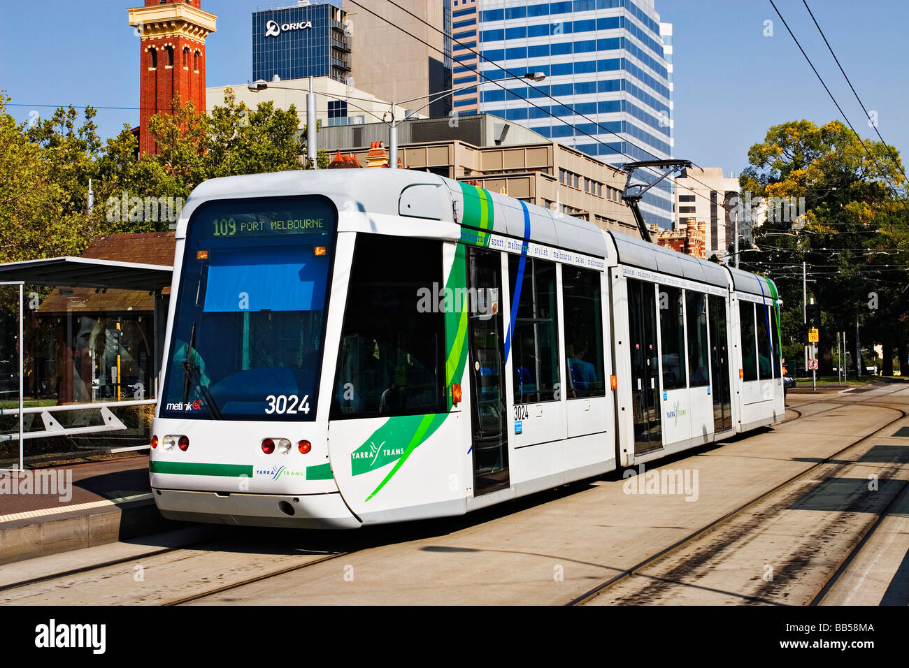 Melbourne Australia / A Melbourne tram is stationary at a tram stop in ...