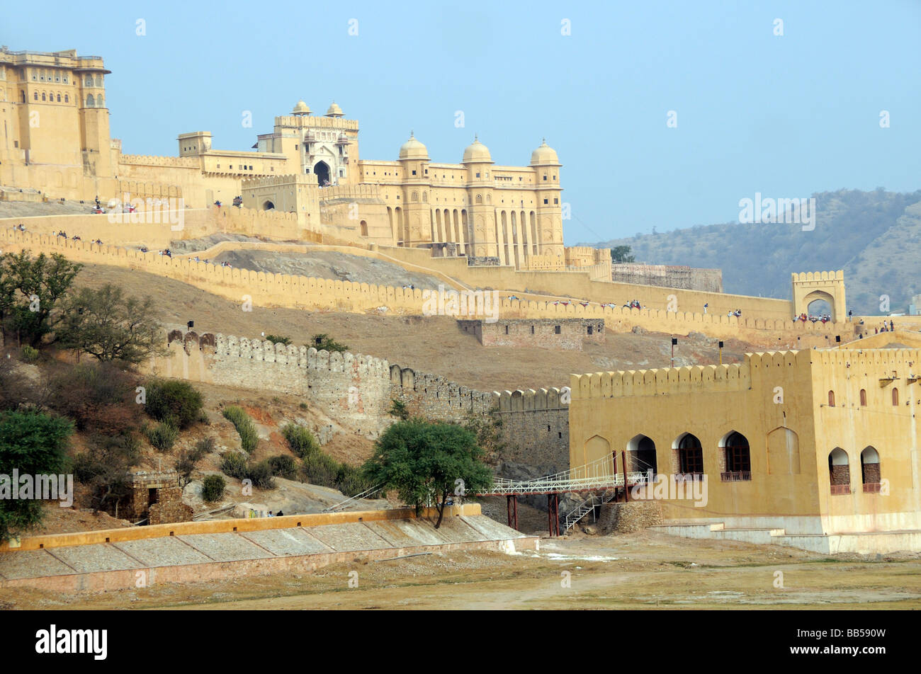 The massive sandstone walls and fortifications of the Amber Fort Stock ...