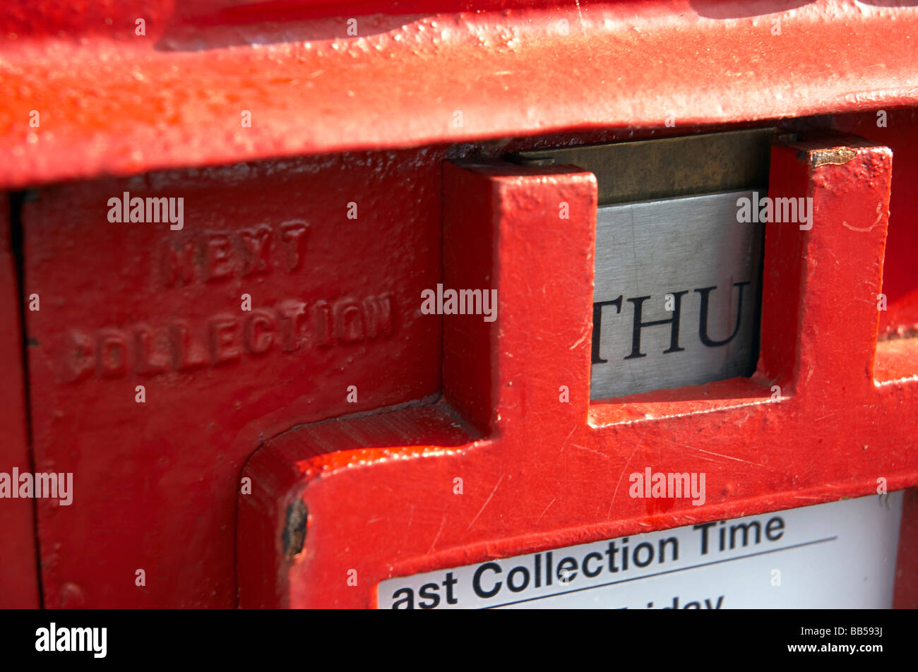A red English post box showing the next collection time Stock Photo - Alamy