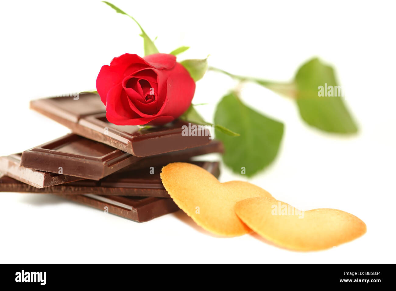 Red Rose with chocolate cookie Stock Photo - Alamy