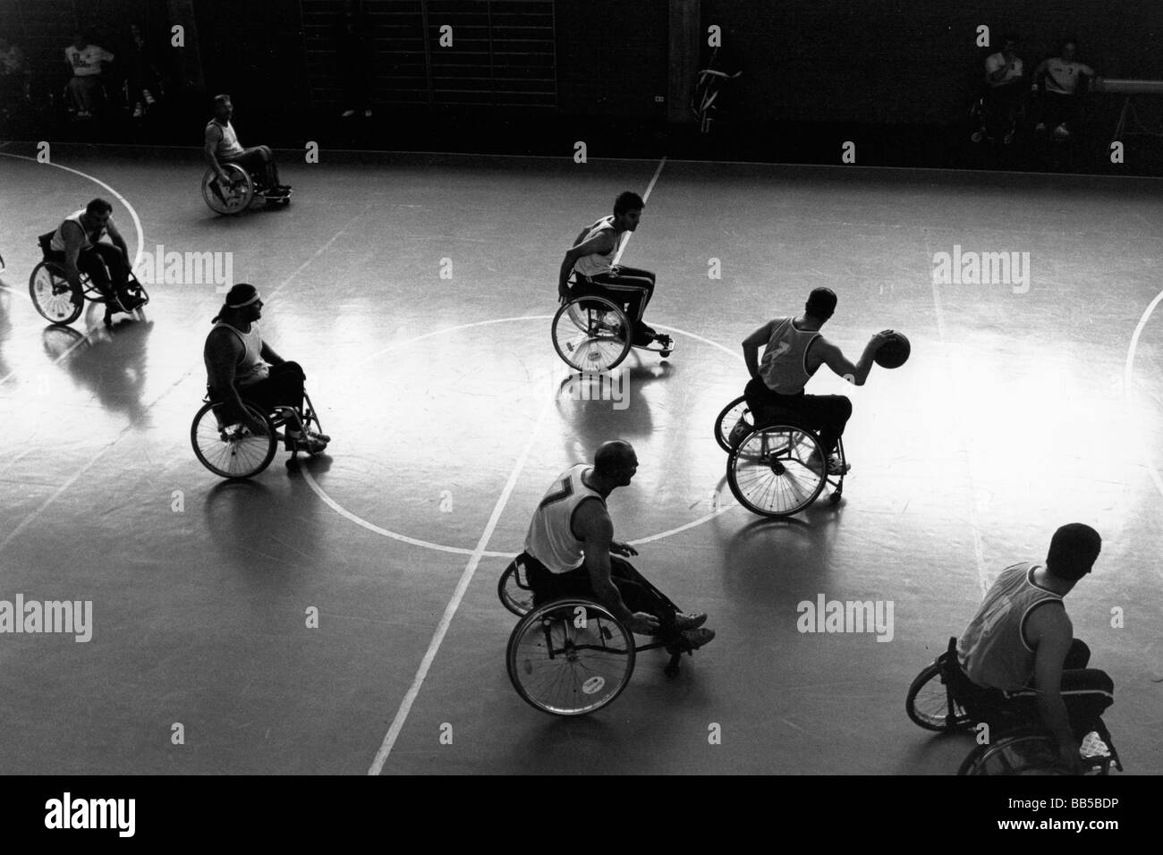 Helping handicapped sport Black and White Stock Photos & Images - Alamy