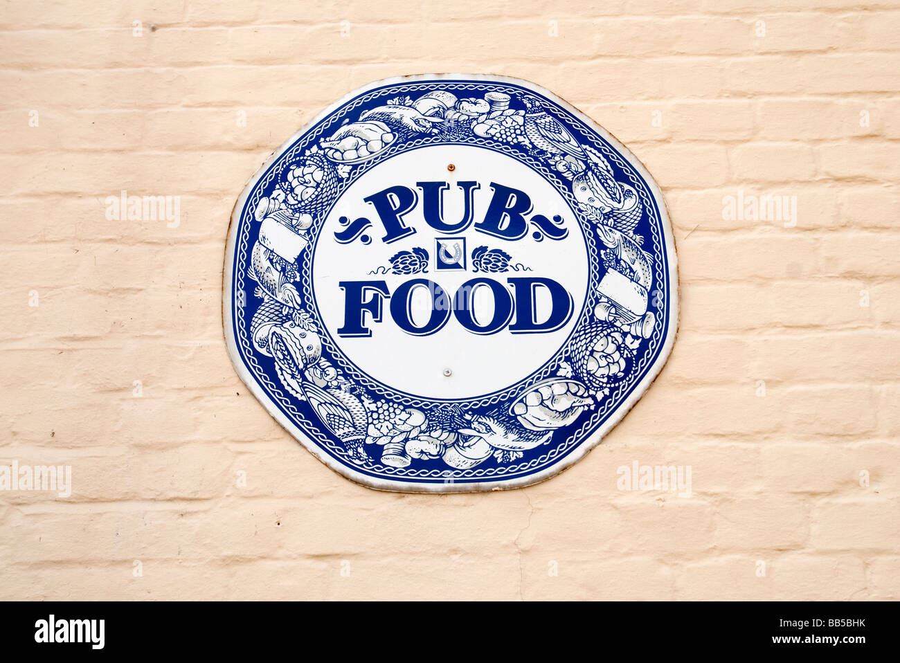 pub food sign on side of a public house Stock Photo - Alamy