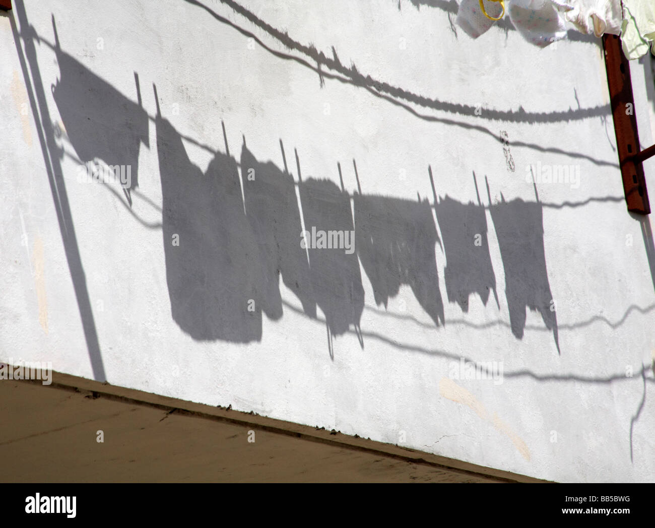 shadows of clothes drying on washing line at Vinales, Pinar del Rio ...