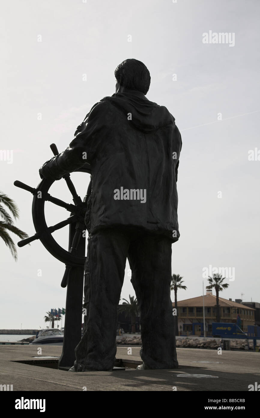 Statue of a sailor at entrance to harbour Stock Photo - Alamy