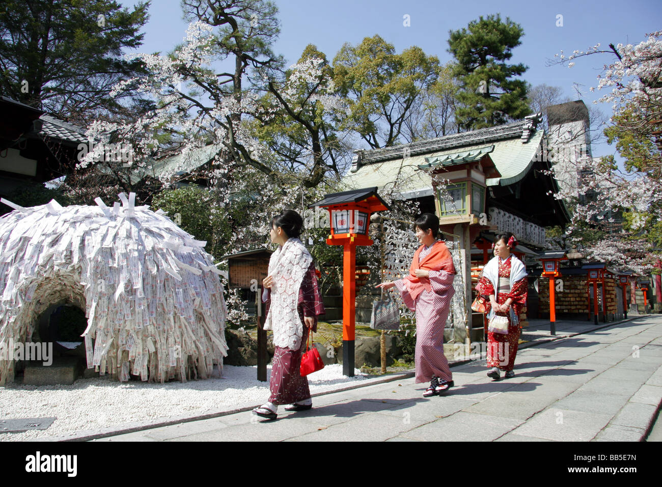 Women dressed as Geisha wearing Kimono at a temple in Kyoto, Japan ...
