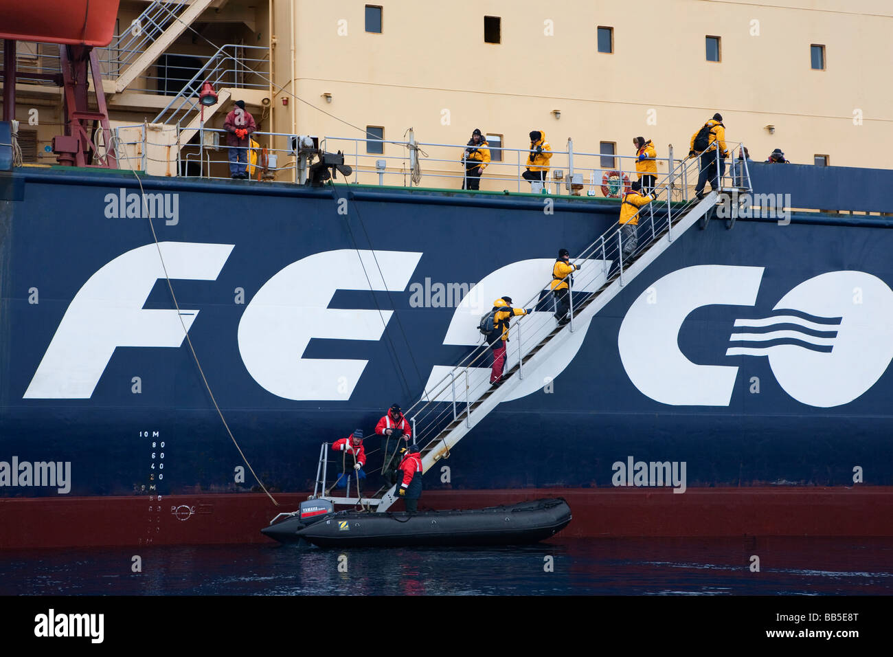 Passengers boarding icebreaker cruise ship from zodiac antarctica hi ...