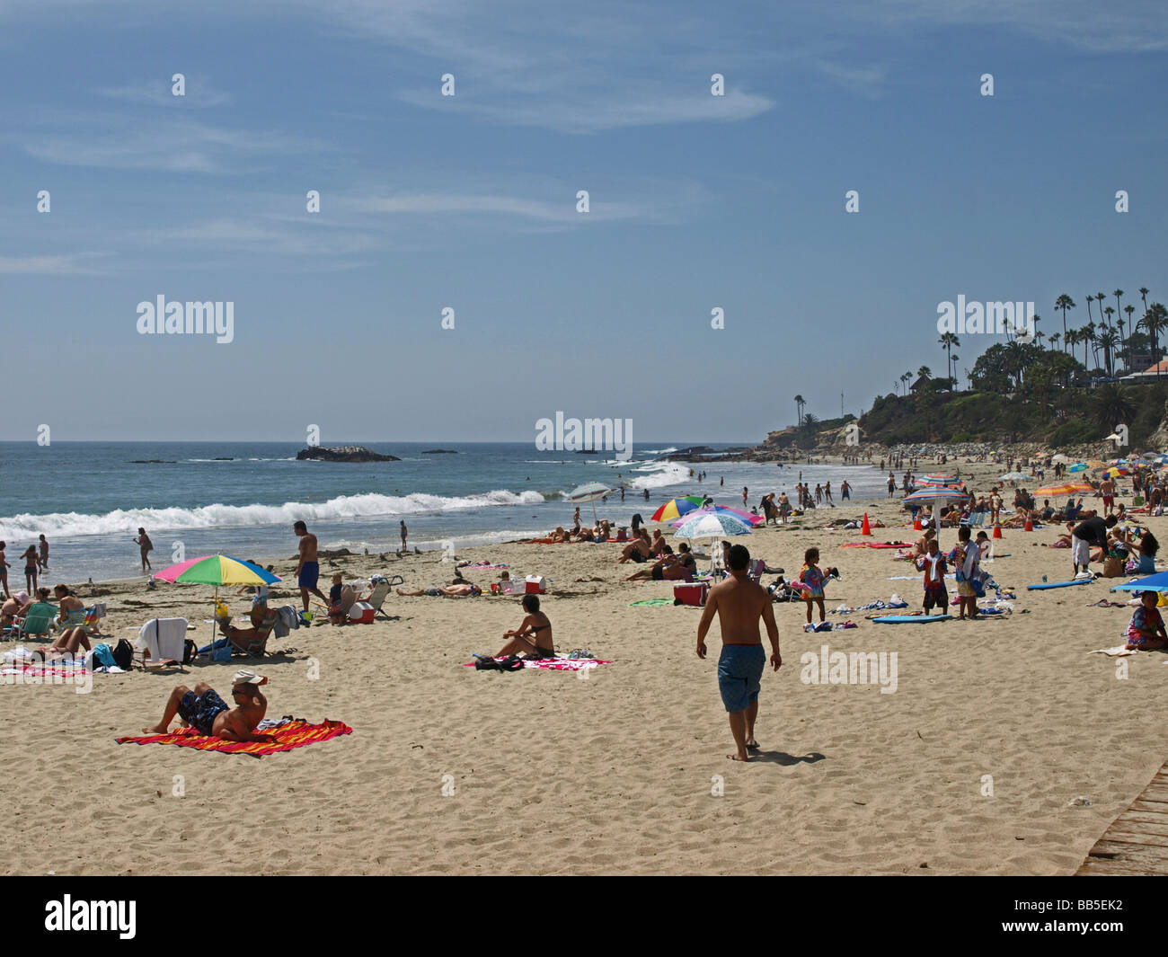 Laguna beach California with many people sunbatshing, walking and ...