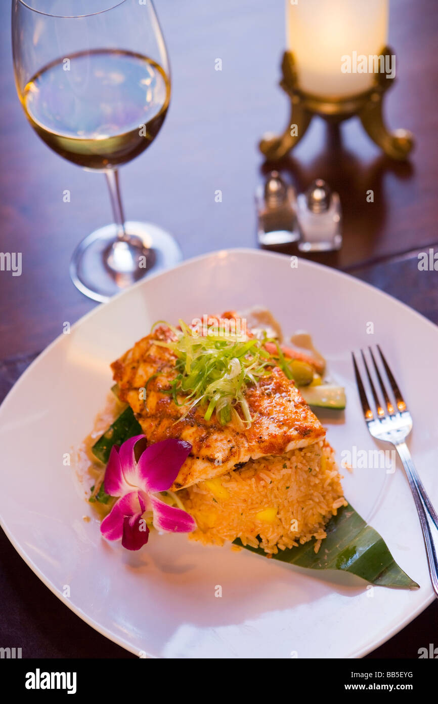 grilled ono with mango sticky rice and coconut curry sauce with glass ...