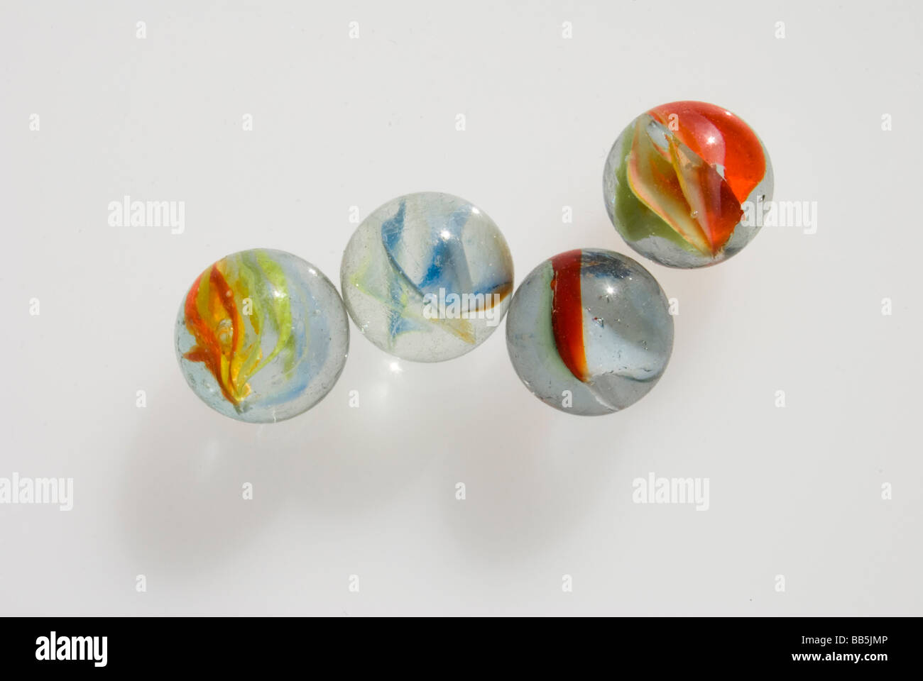 Four marbles hi-res stock photography and images - Alamy