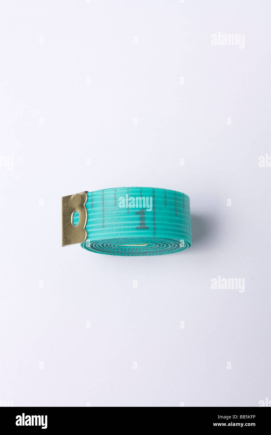 Turquoise blue Rolled up Tape Measure Studio Cut out Stock Photo - Alamy