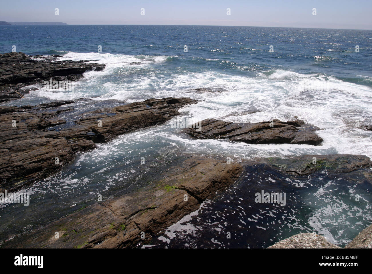 waves crashing onto rocks, Cornwall, UK Stock Photo - Alamy