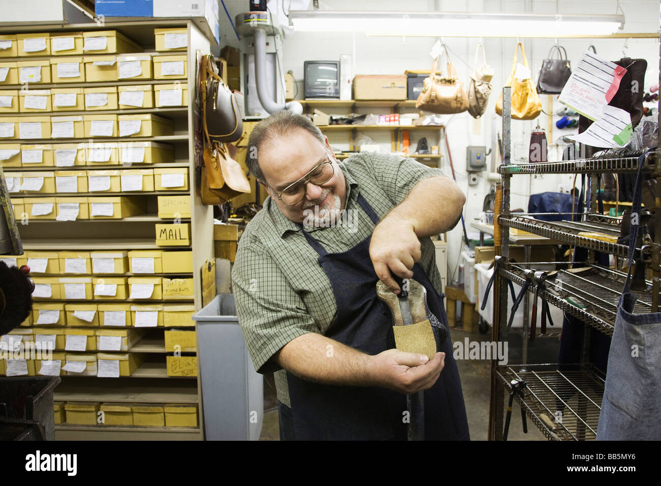Traditional shoemaker workshop Stock Photo - Alamy
