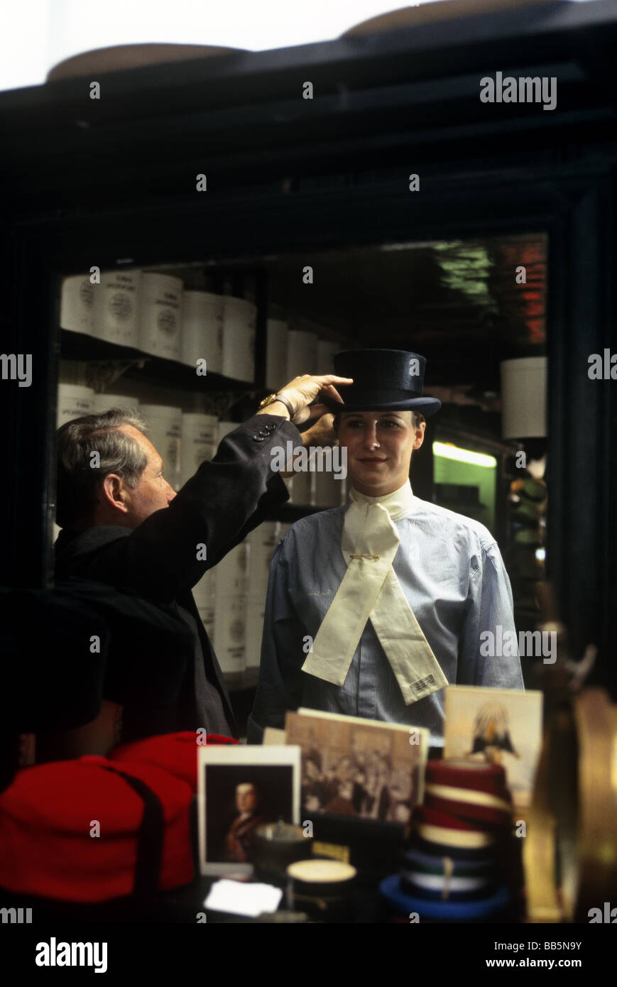 Hat fitting hi-res stock photography and images - Alamy