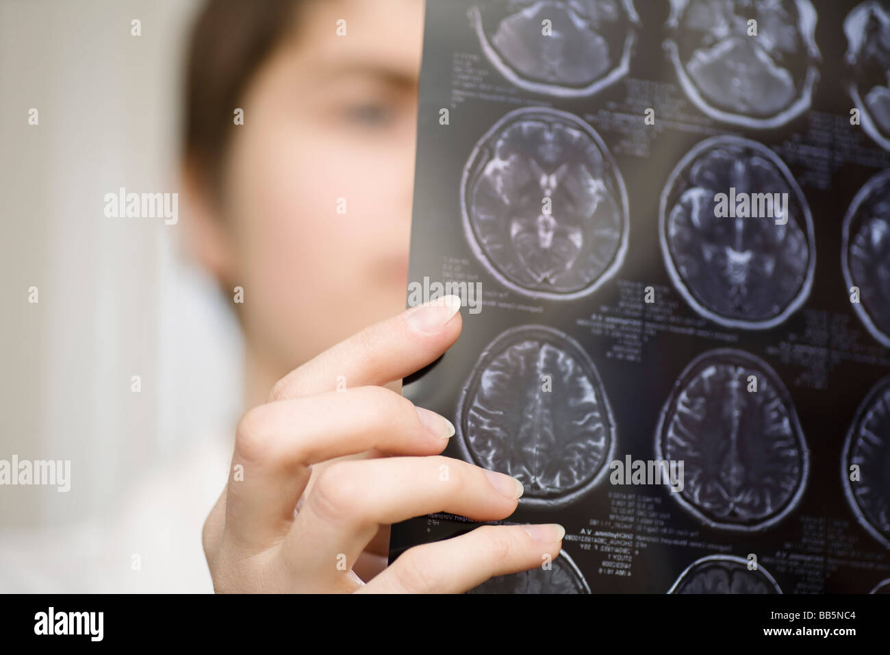 Female doctor holding CAT scan Stock Photo - Alamy