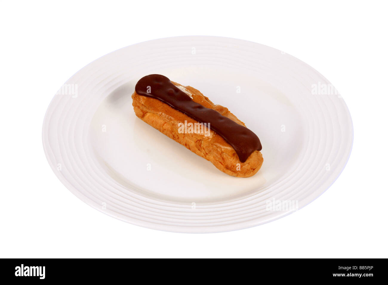 A single Chocolate Eclair on a plate against a white background Stock ...
