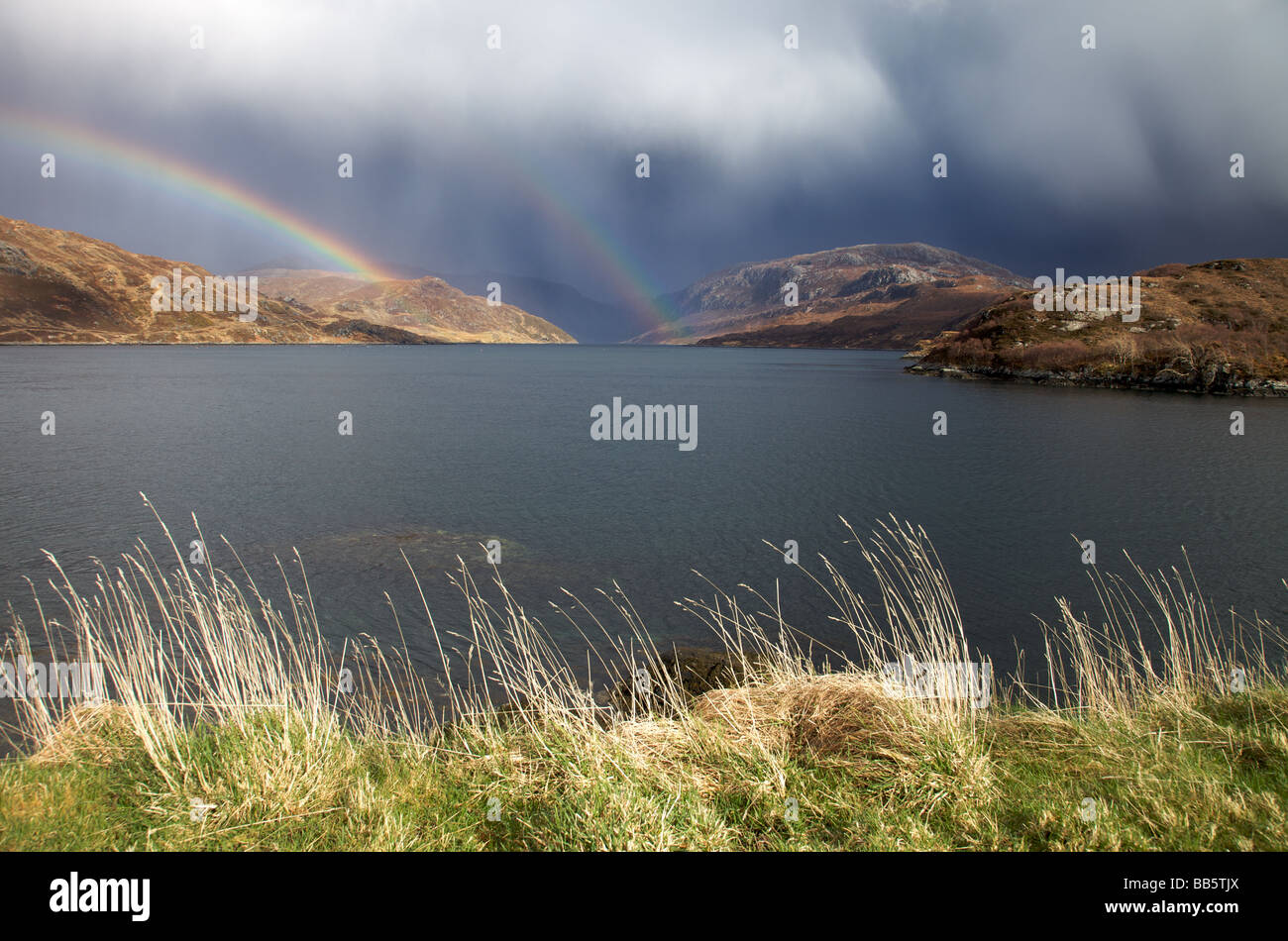 Rainbow dark clouds scotland hi-res stock photography and images - Alamy