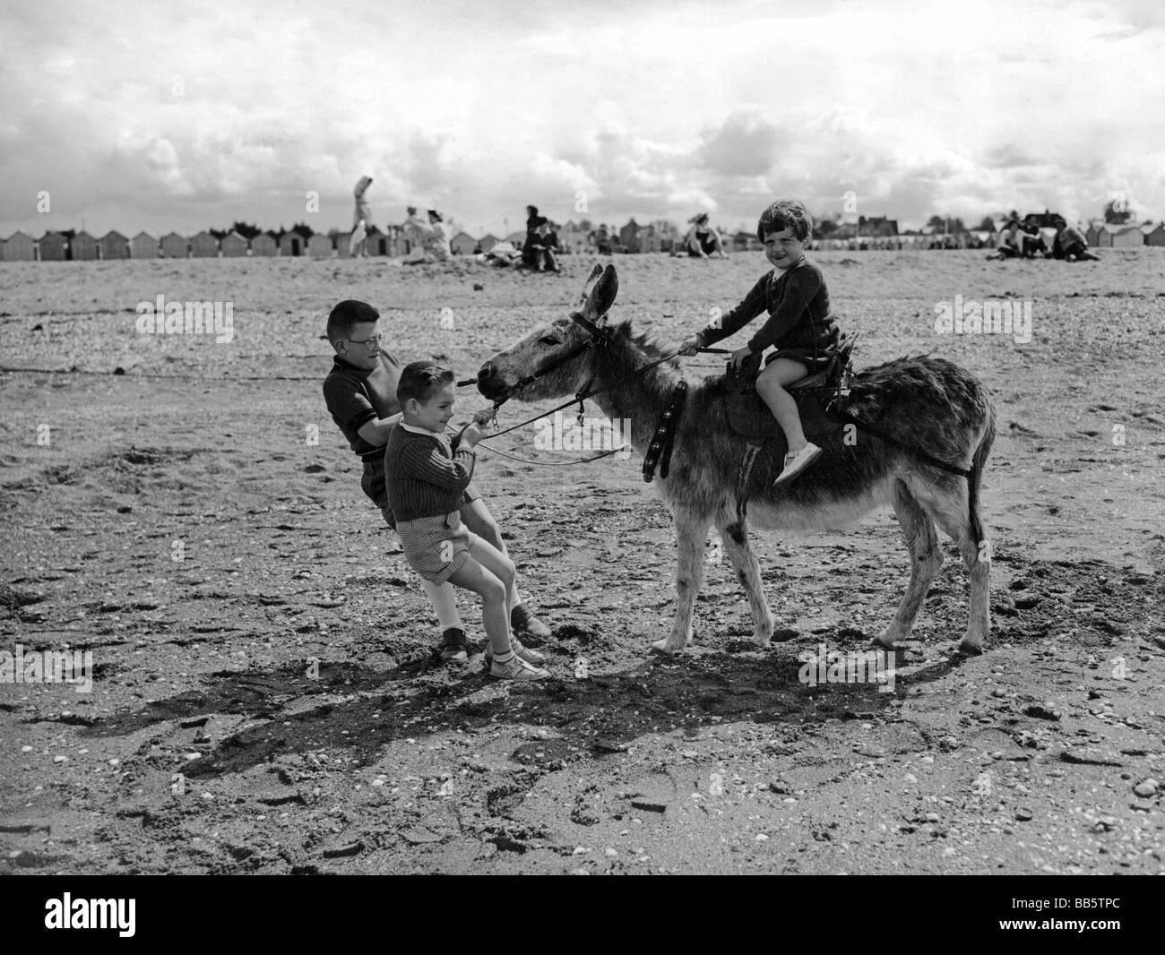Children donkey 1950s hi-res stock photography and images - Alamy