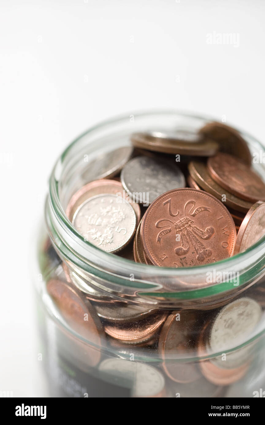 Loose change: a jam jar full of British coins. Picture by Jim Holden ...