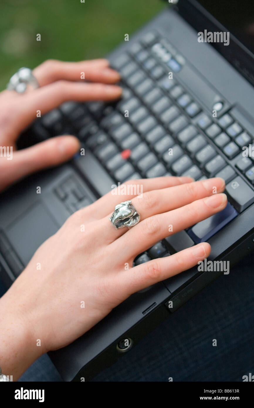 Female Hands typing on Laptop close up Stock Photo - Alamy