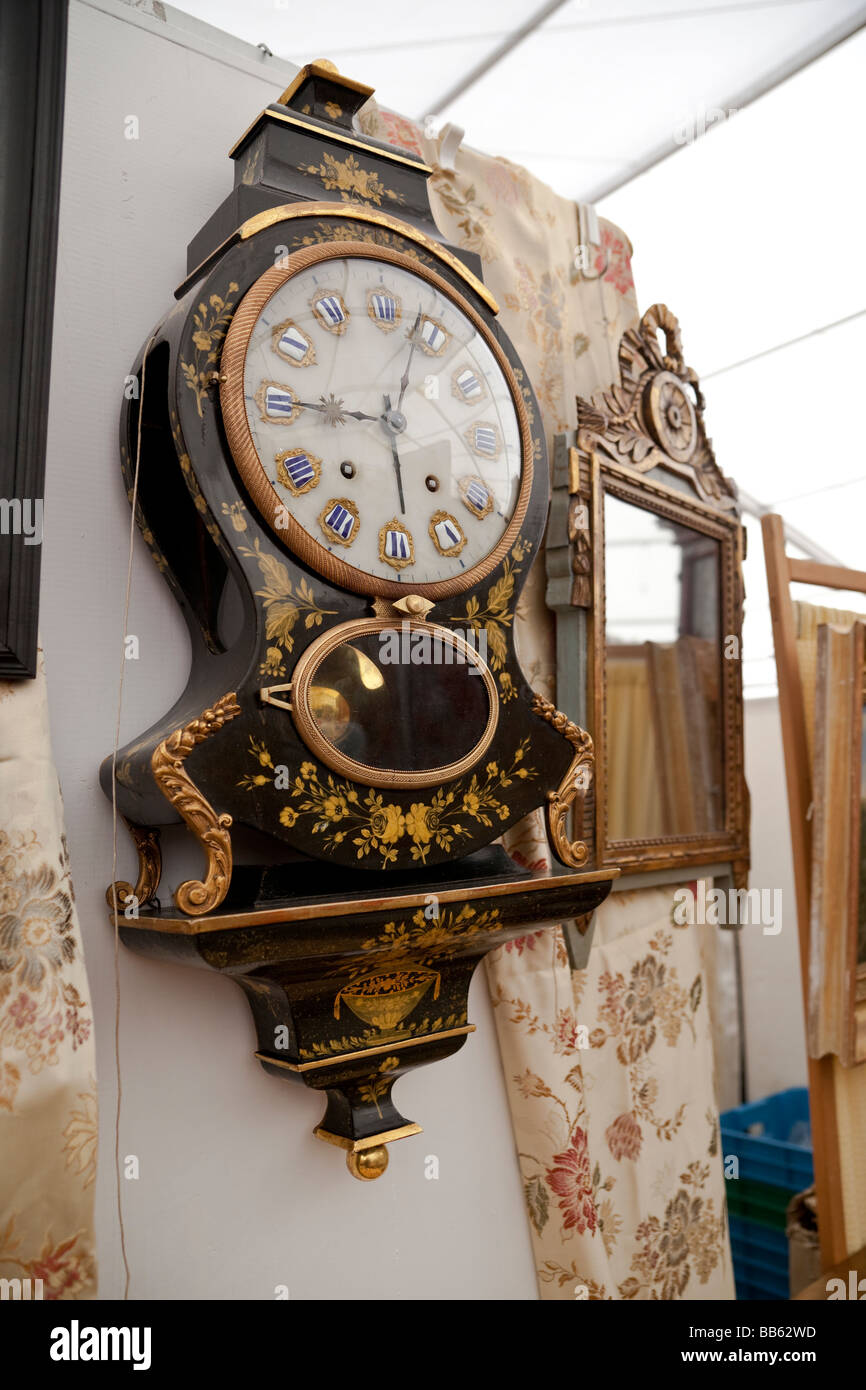 Antique wall clock at the antique market in Neuchatel Switzerland Stock ...