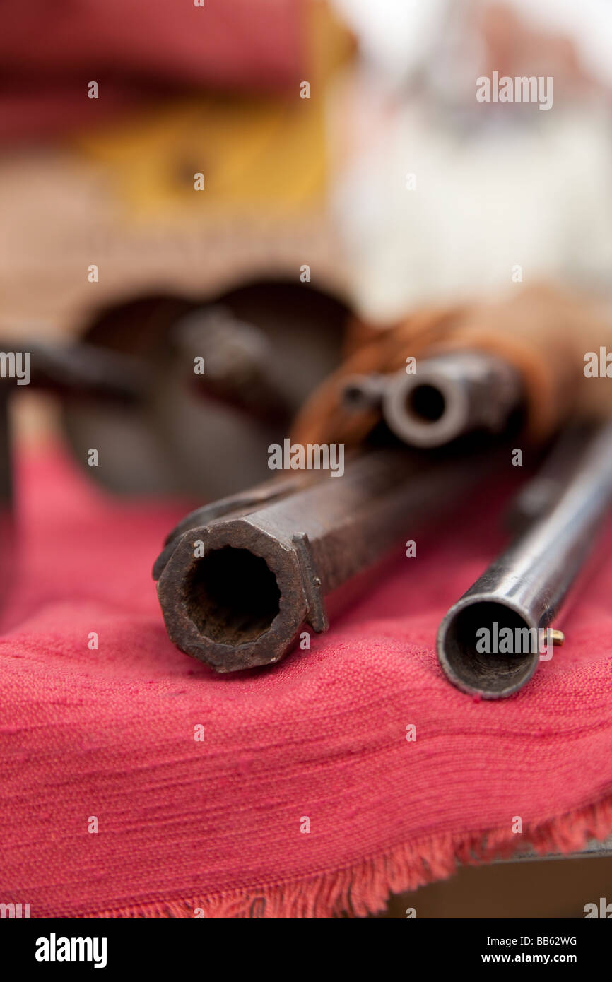 Shallow depth of field DOF view of antique rifle barrels; antique ...