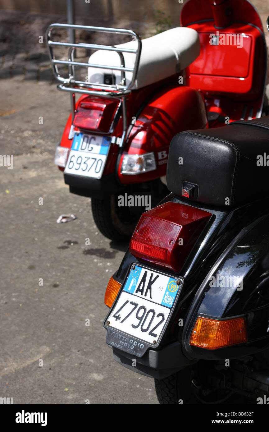 Two Vespa scooters in Rome, Italy Stock Photo - Alamy