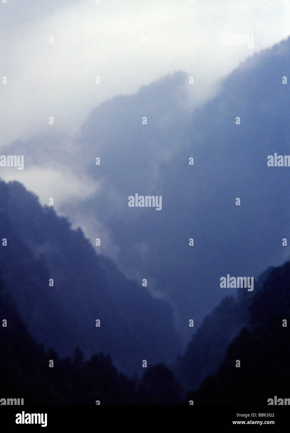 misty mountain valley Stock Photo - Alamy