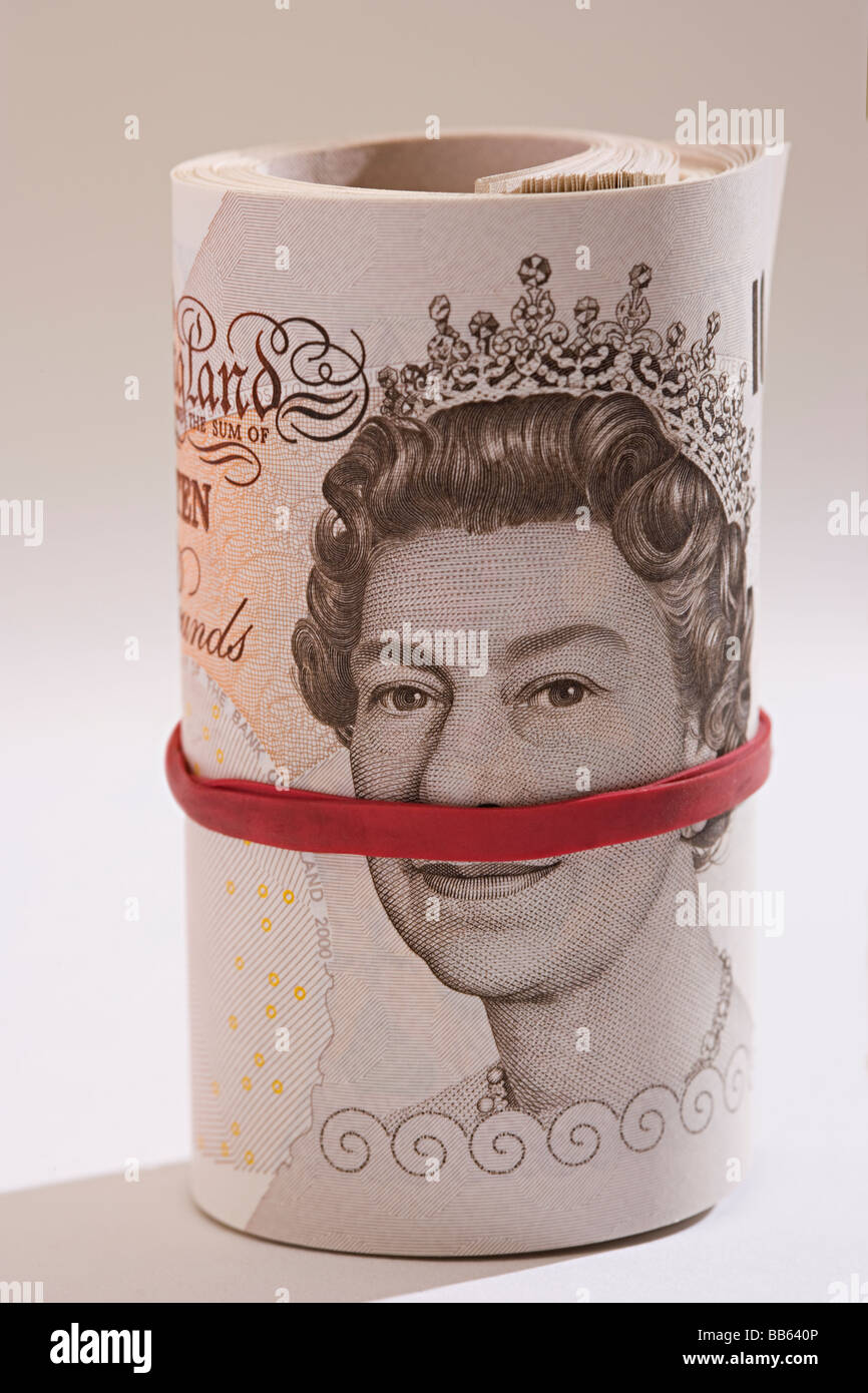 new and unused roll of UK Sterling mint ten pound bank notes rolled up ...