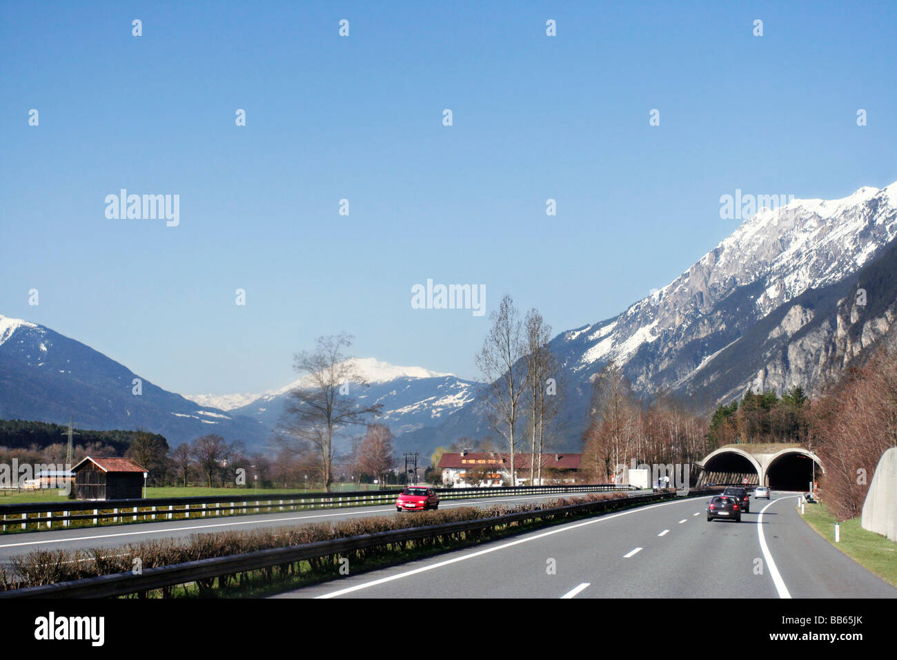 View of snow cap mountain from Austrian highway Stock Photo - Alamy