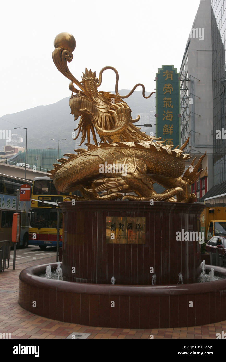 A statue of a golden dragon on Hong Kong Island, Hong Kong Stock Photo ...