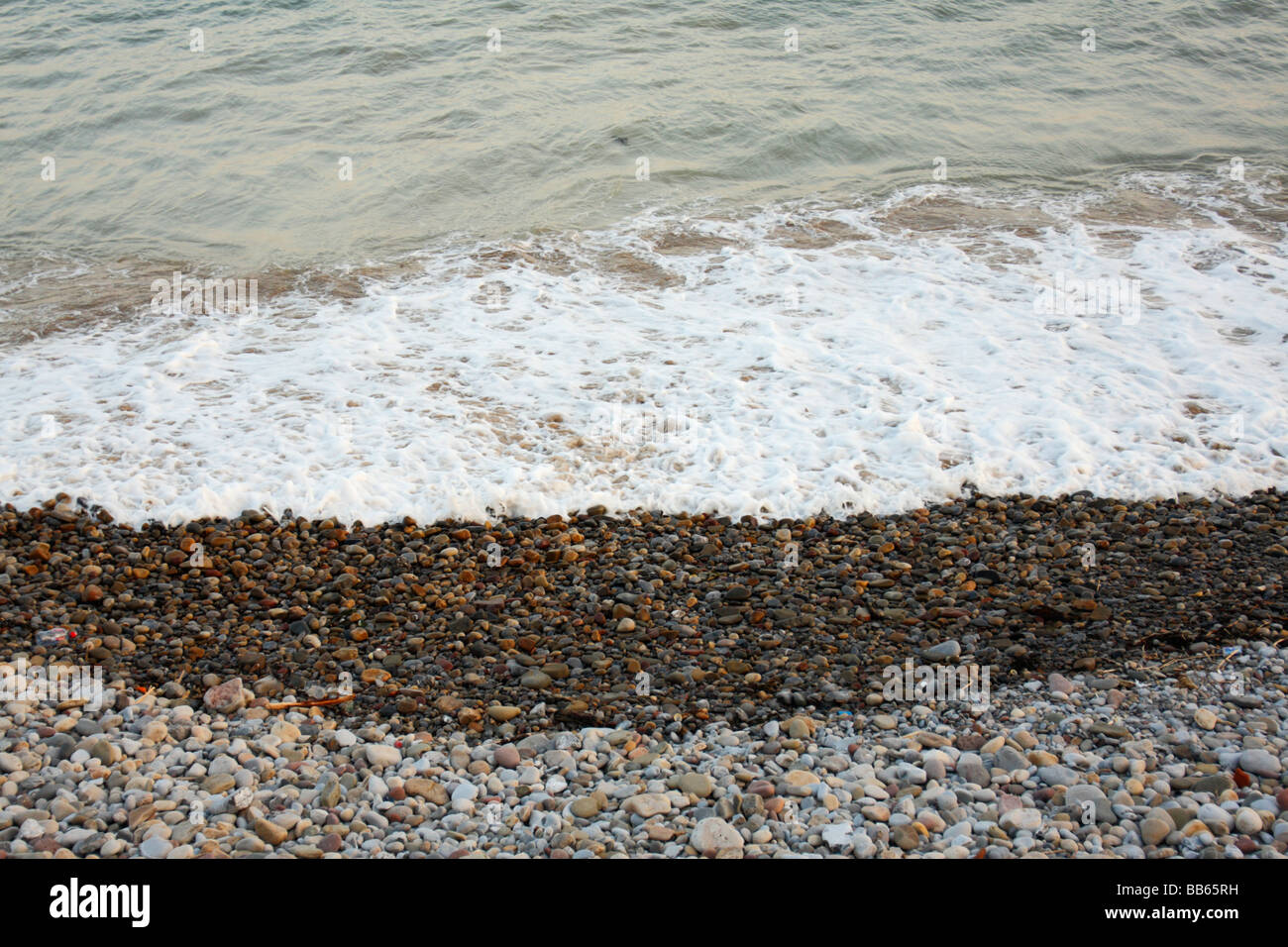Wave washing onto beach hi-res stock photography and images - Alamy