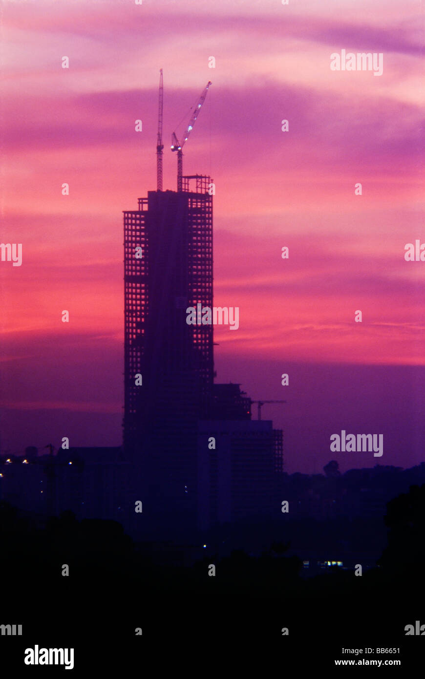 Sunset scene of a skyscraper construction site Stock Photo - Alamy