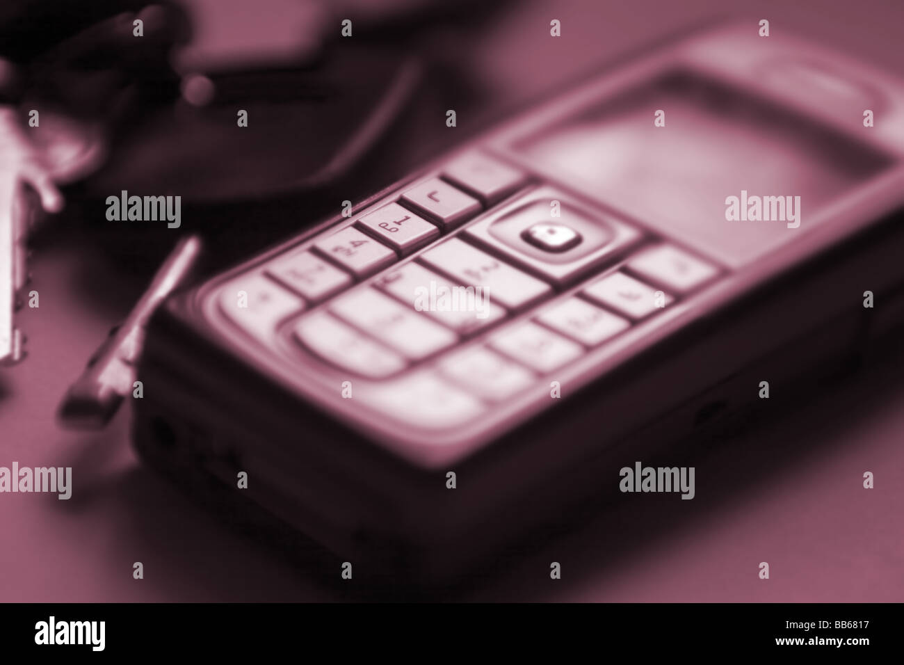 Mobile phone with keys Stock Photo - Alamy