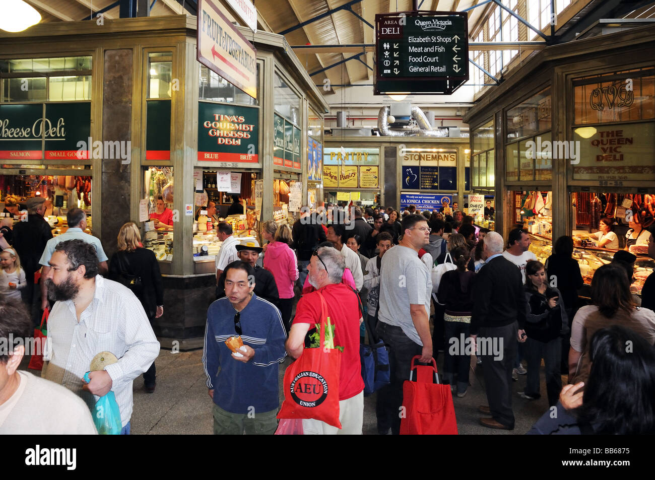 Multiracial crowd people men women in Queen Victoria Market Melbourne ...