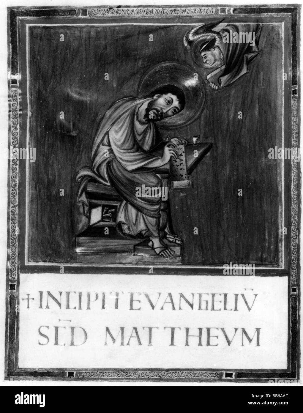 Saint matthew writing gospel Black and White Stock Photos & Images - Alamy