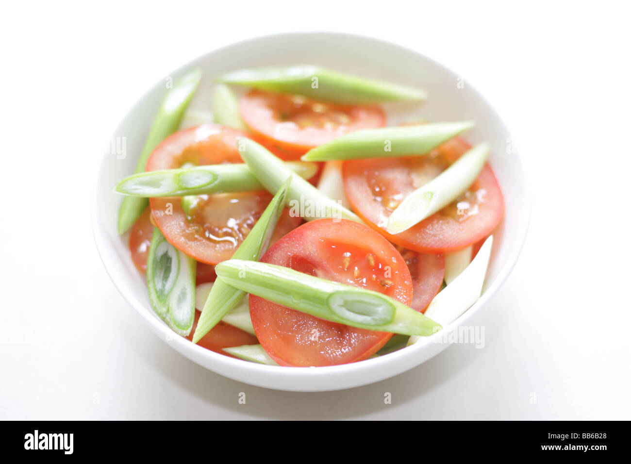 Slices of Tomato and Runner Beans Stock Photo - Alamy